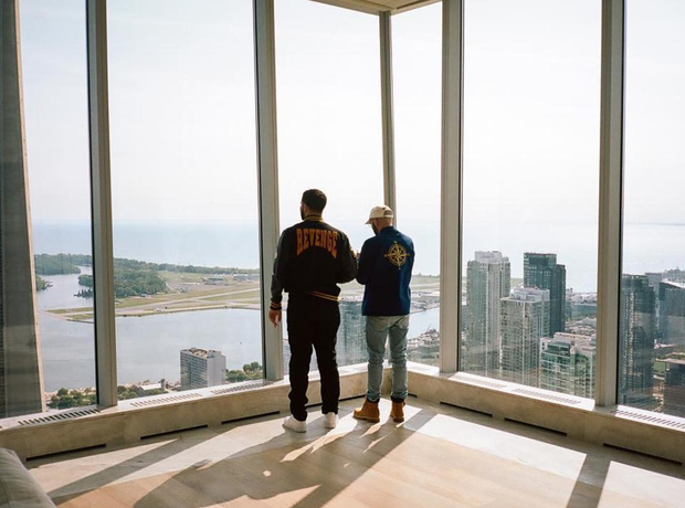 Drake and his producer "40" looked out over the city of Toronto. - 14 ...